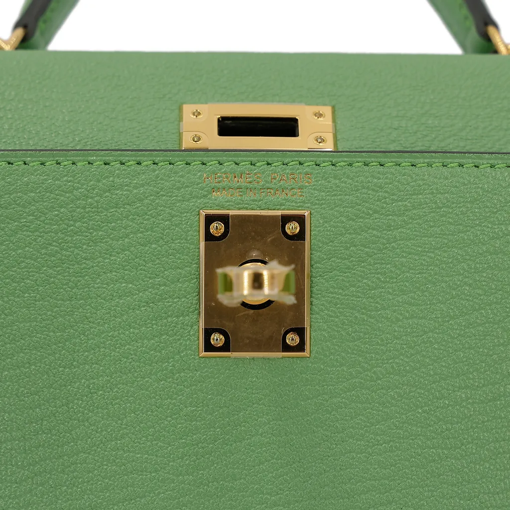 HERMÈS Mini Kelly II crossbody bag in Vert Criquet Chevre leather with ...