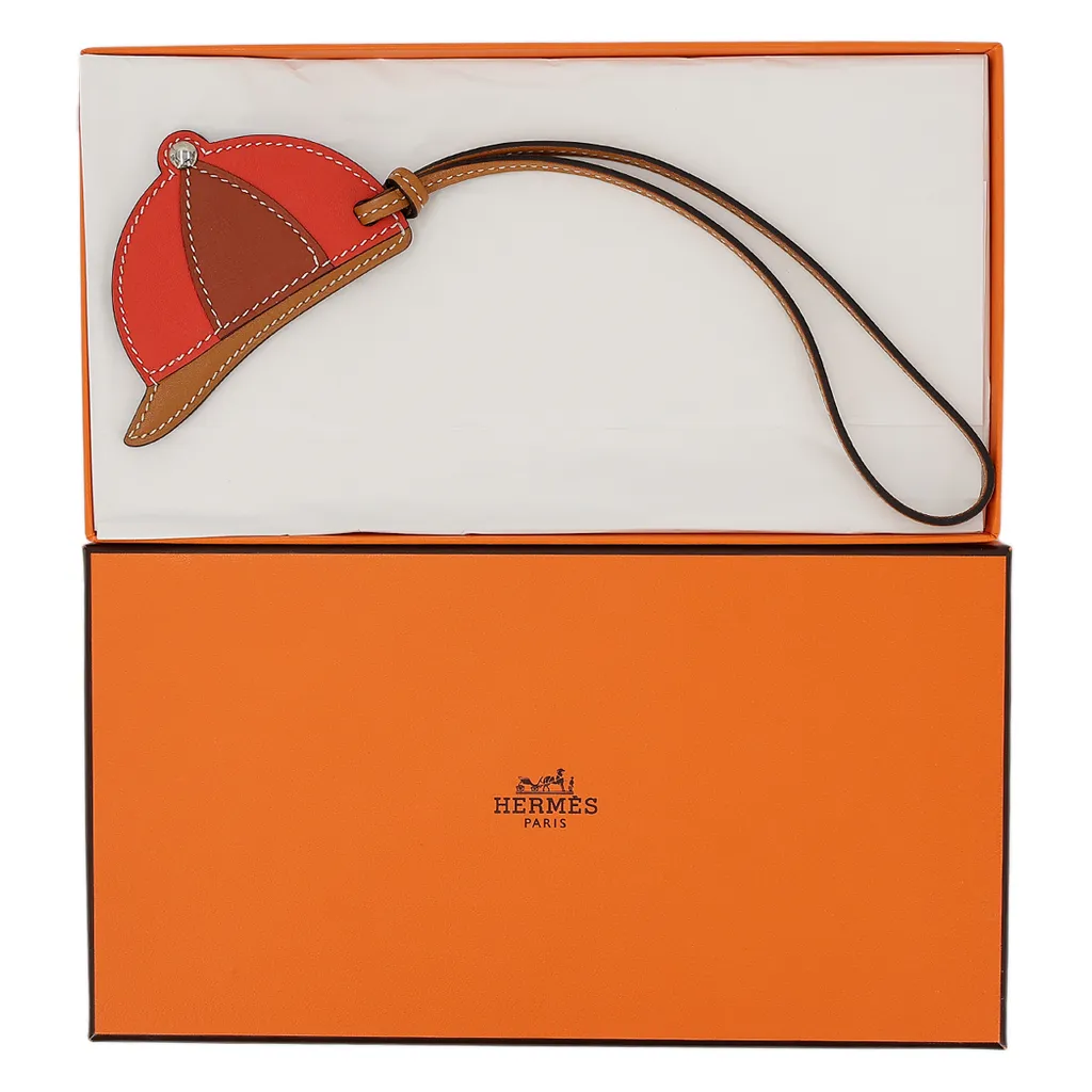 HERMÈS Paddock Bombe charm in Natural Sable, Capucine and Cuivre Swift ...